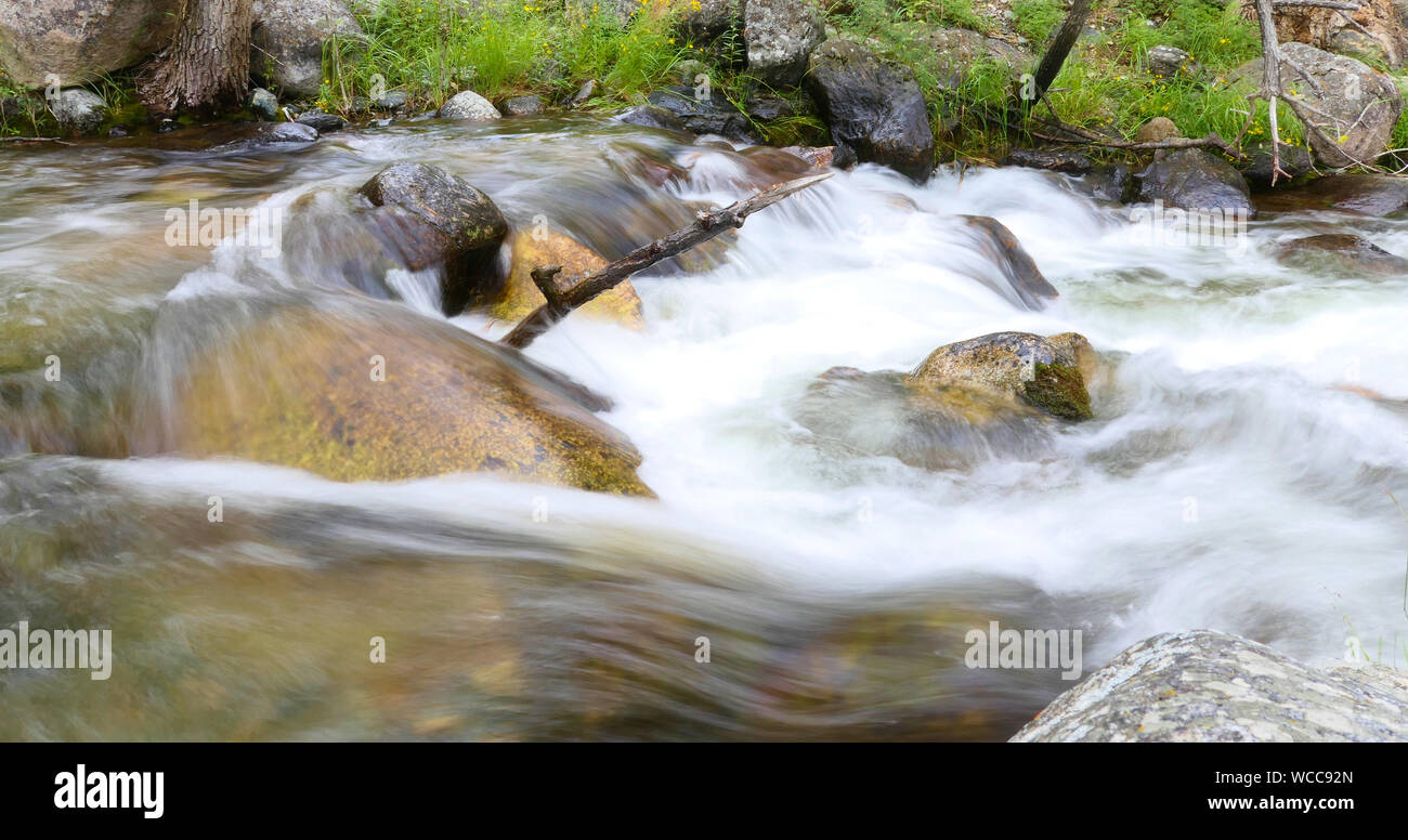 Beautiful mountain river with slow shutter Stock Photo - Alamy