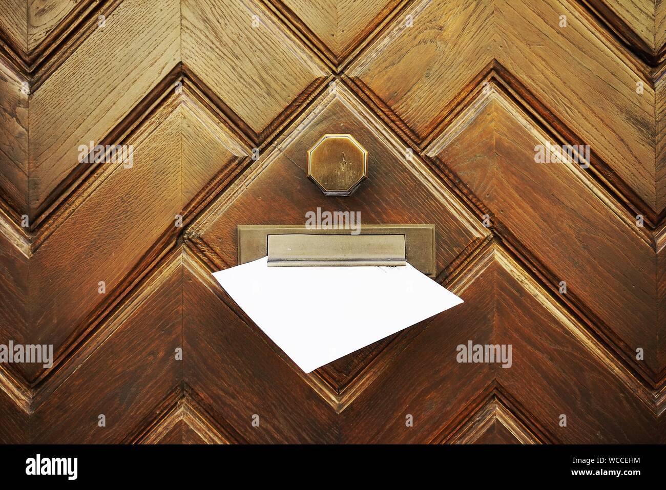 Wooden door with mail slot hi-res stock photography and images - Alamy