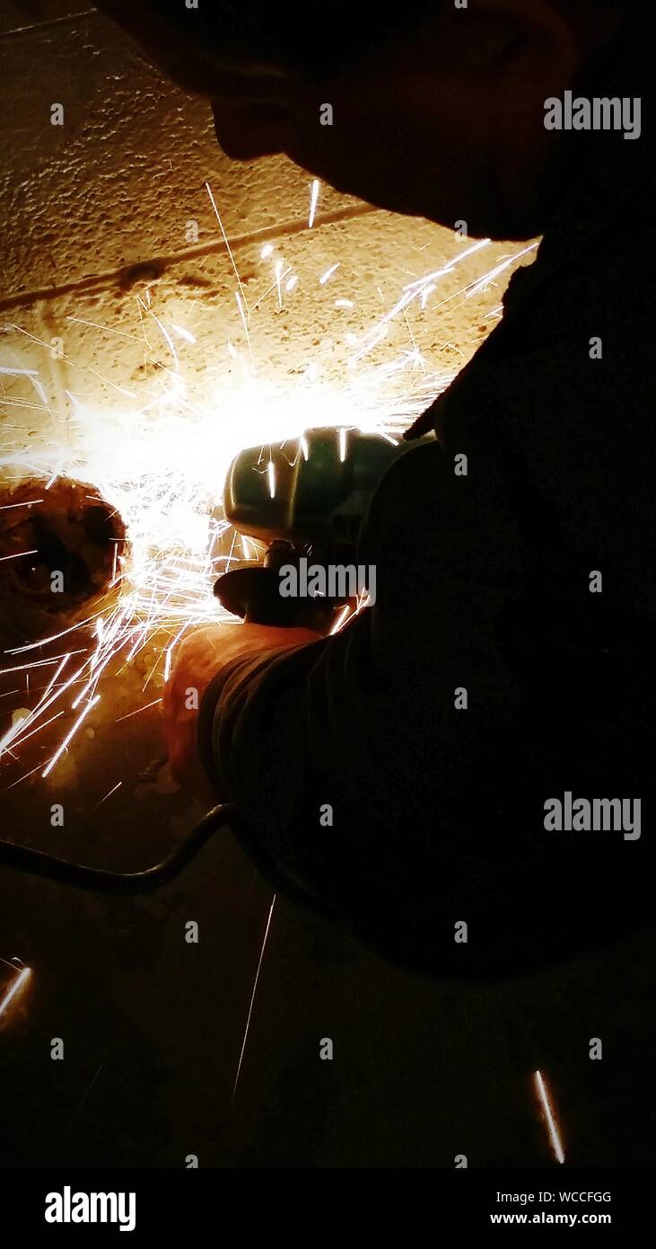 One hand angle grinder hi-res stock photography and images - Alamy