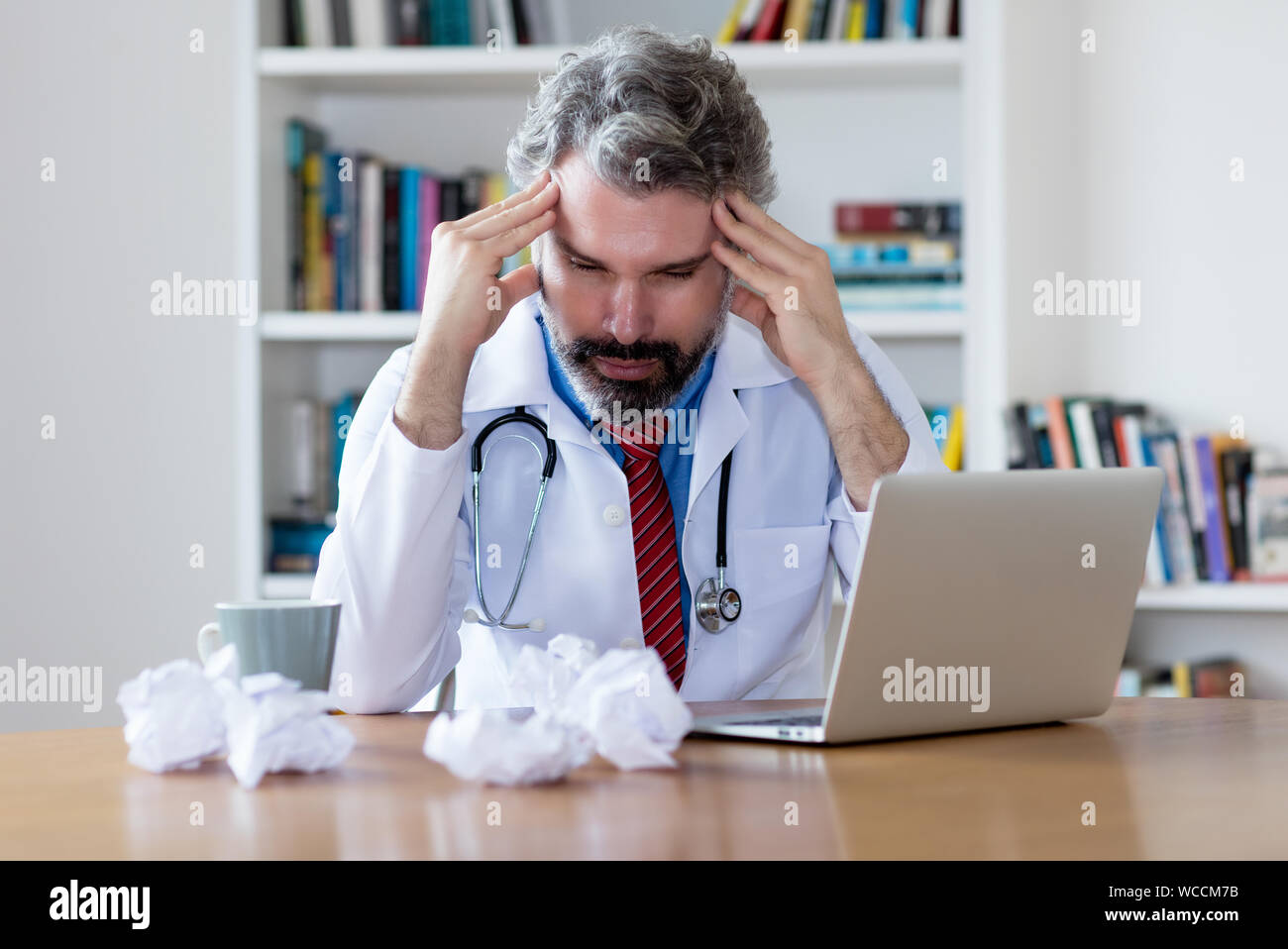 Sad male doctor High Resolution Stock Photography and Images - Alamy
