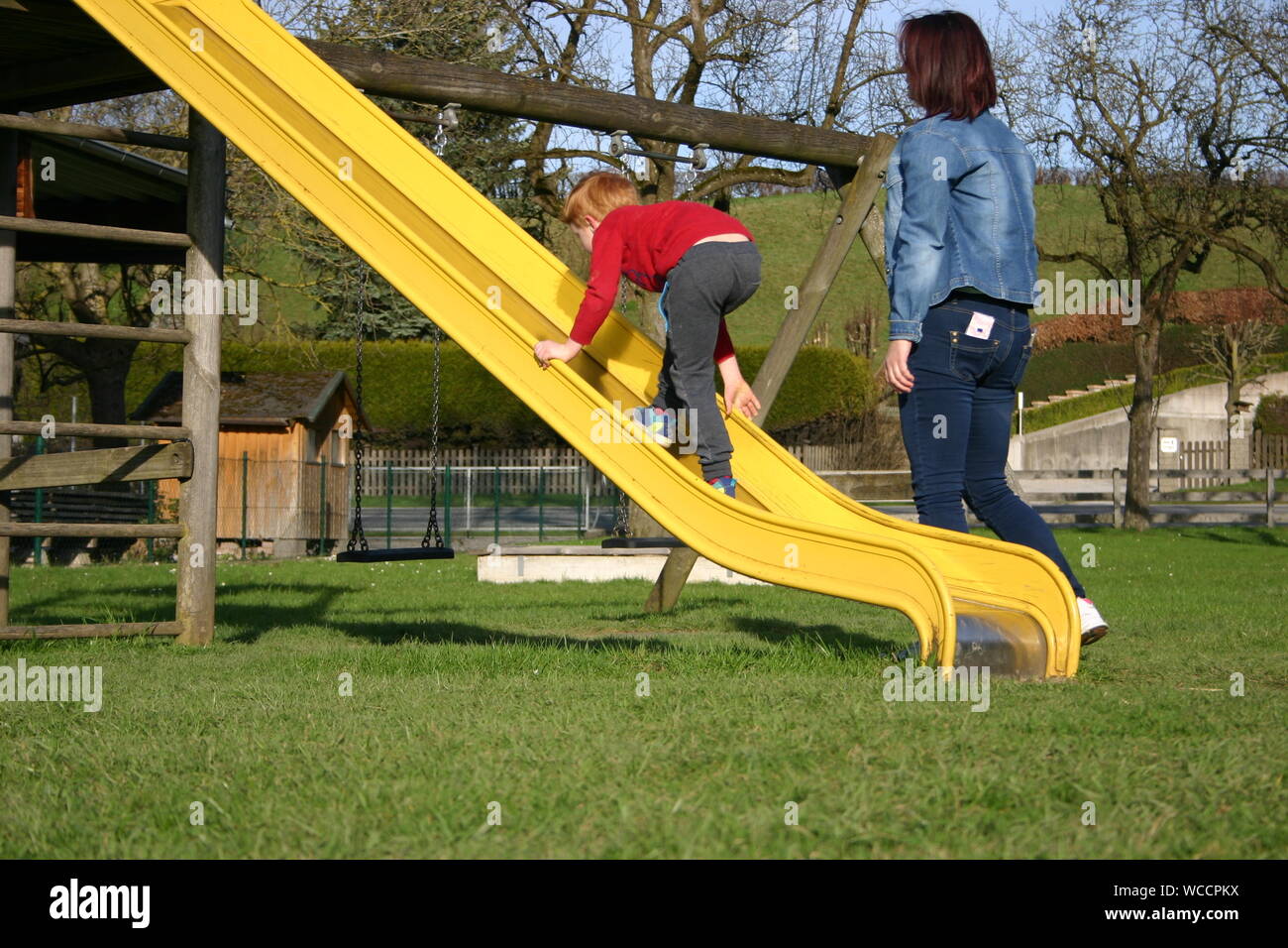 Slide playground side view hi-res stock photography and images - Alamy