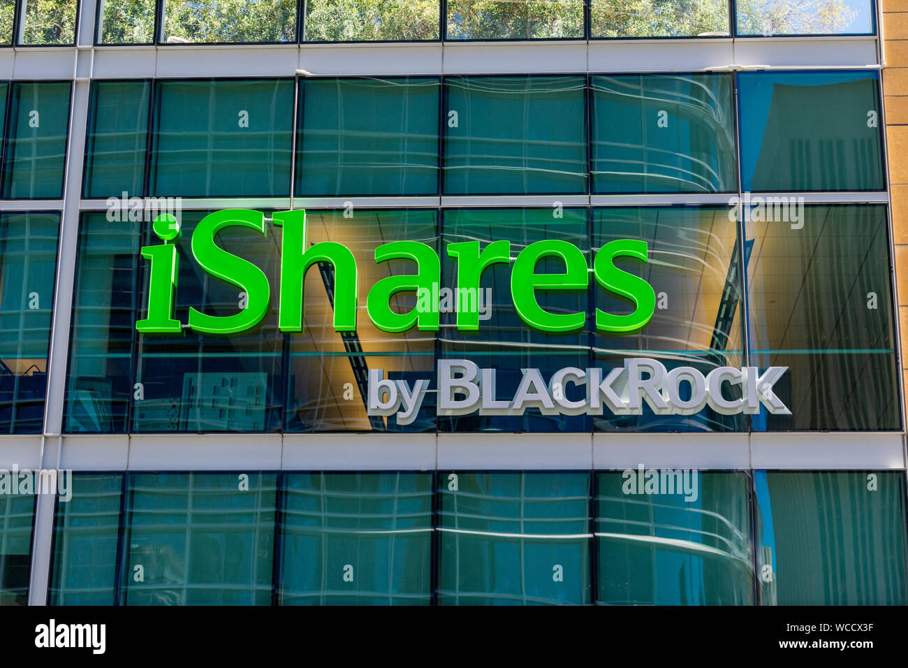 BlackRock sign and logo on glass facade of financial company office ...
