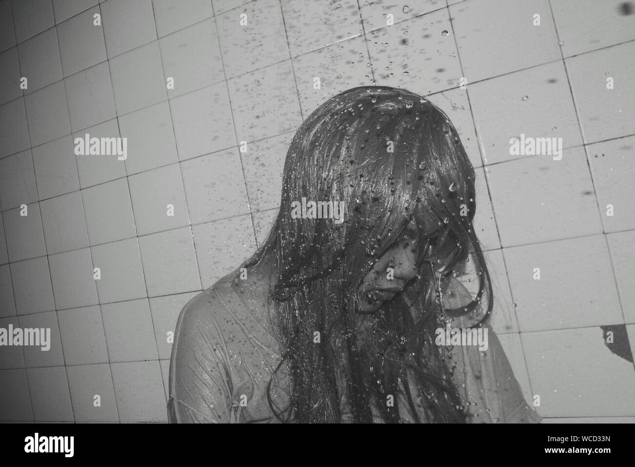 Woman in shower bathroom hi-res stock photography and images - Alamy