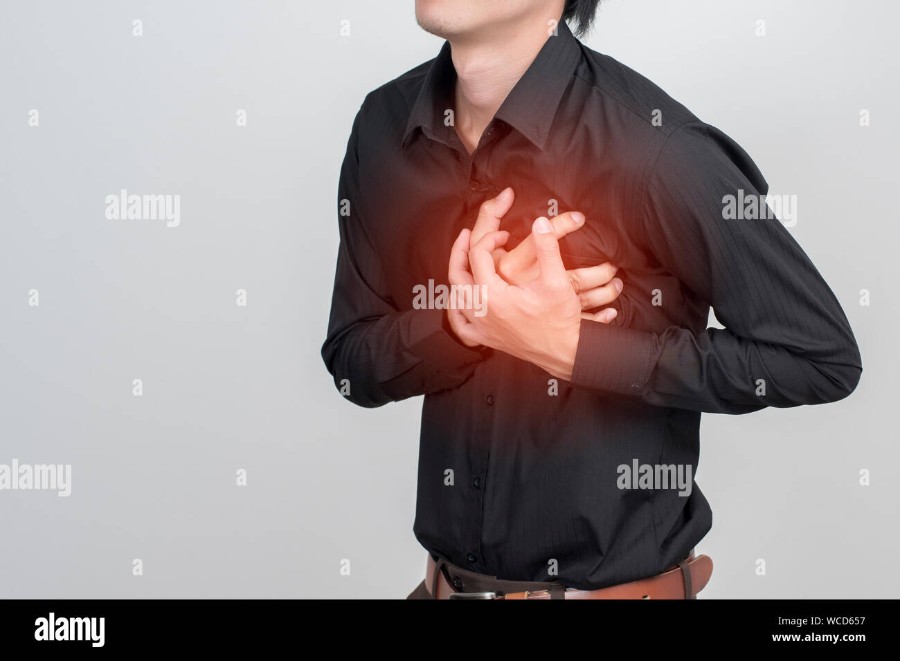 Man clutching chest hi-res stock photography and images - Alamy