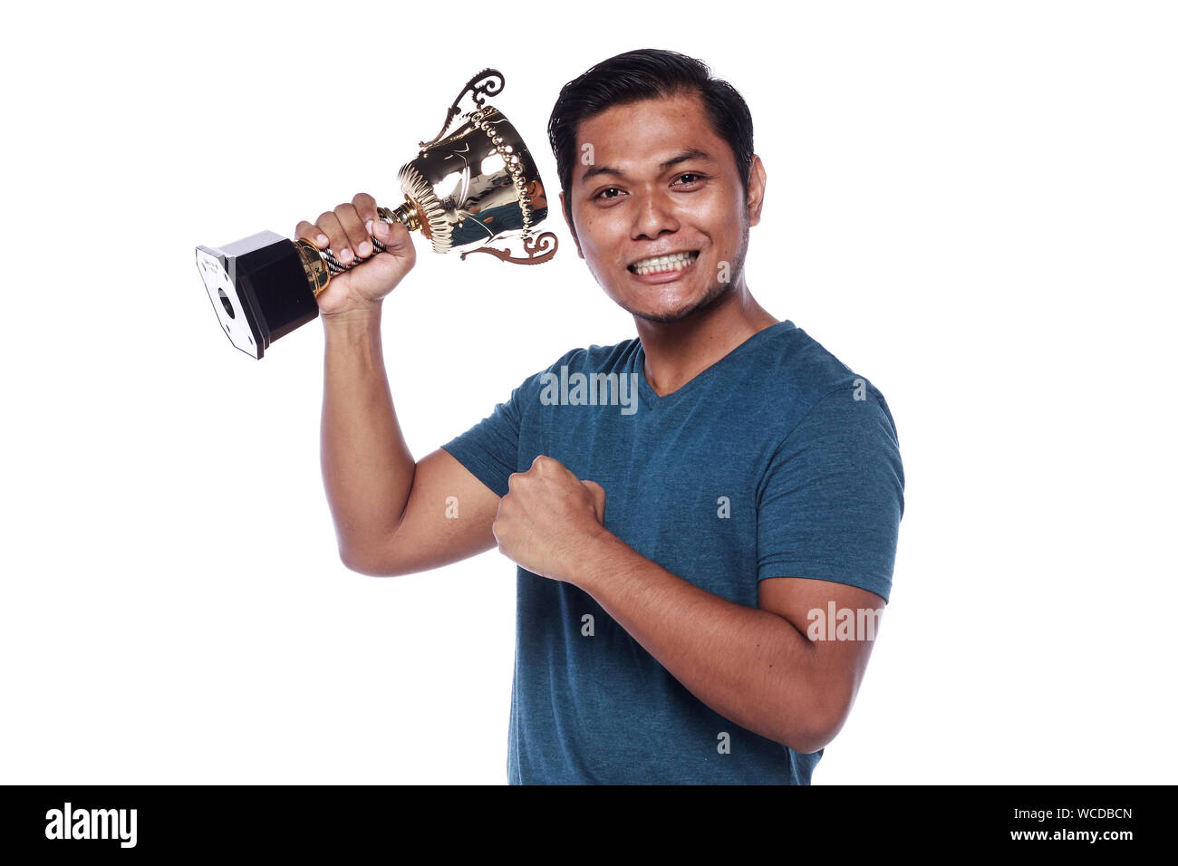Man holding trophy hi-res stock photography and images - Alamy