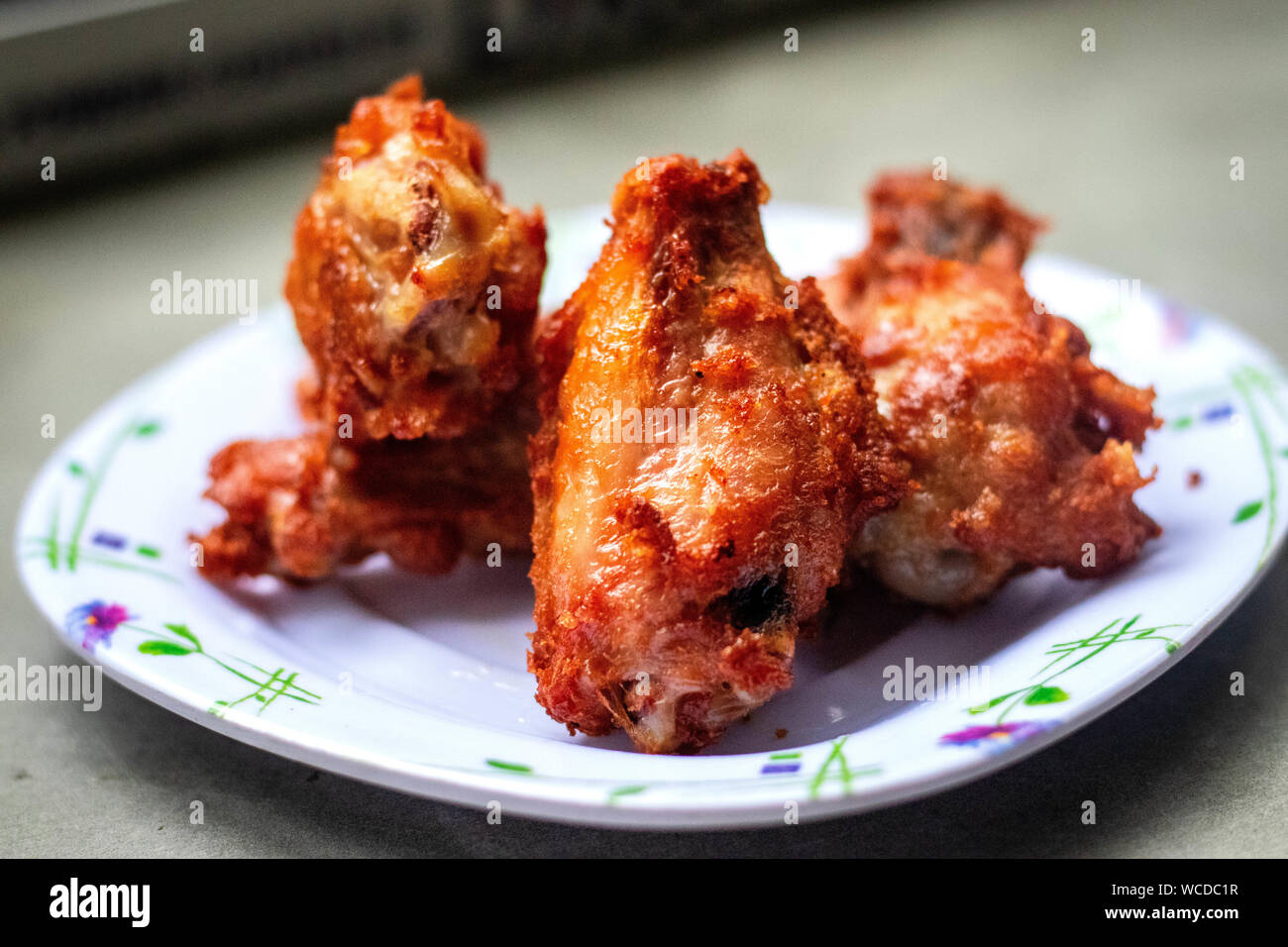 Roasted Chicken Wings serve on white plate Stock Photo - Alamy