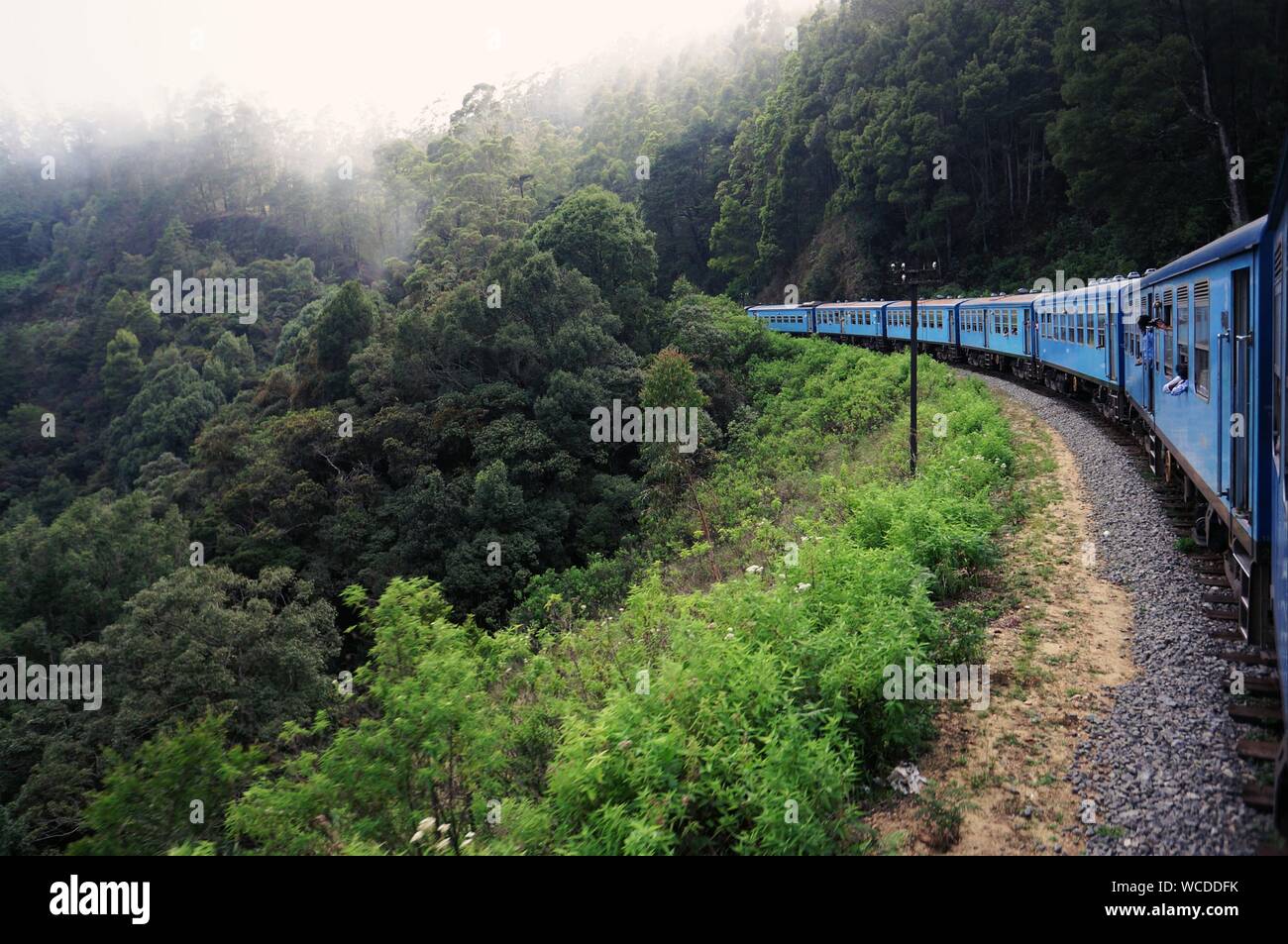 Blue passenger train hi-res stock photography and images - Alamy