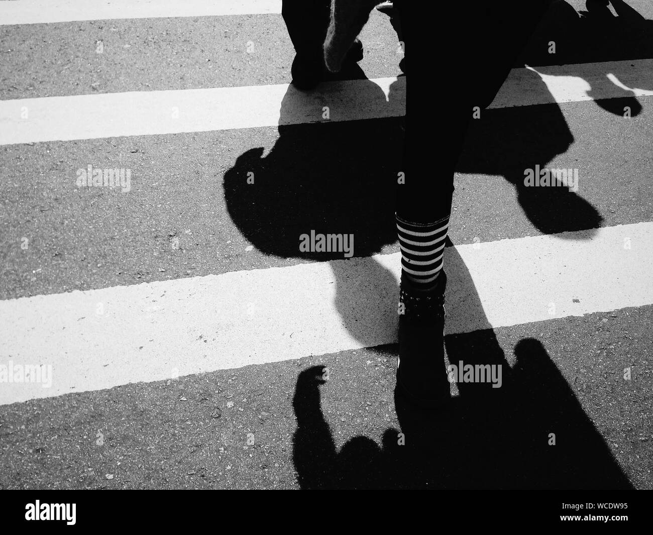 Walking on crosswalk hi-res stock photography and images - Alamy