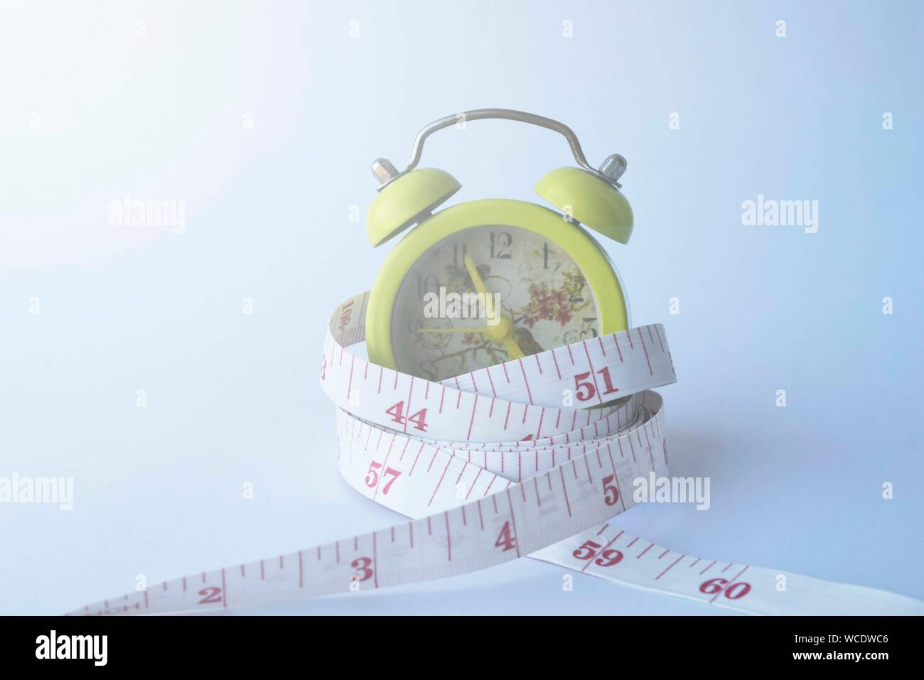 Clock tape measure hi-res stock photography and images - Alamy