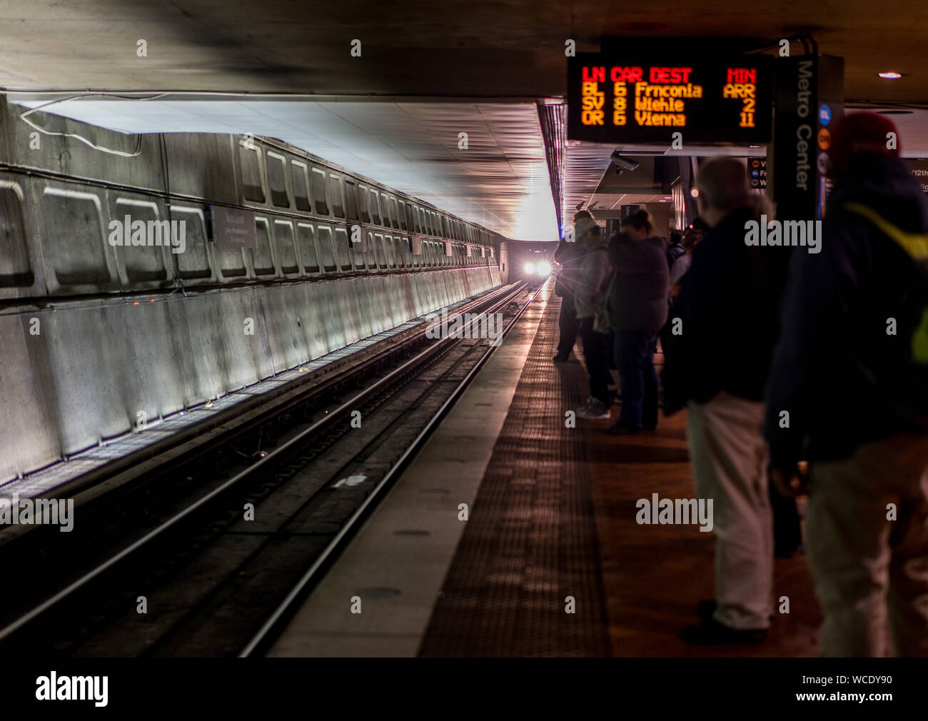 Commuters entering subway hi-res stock photography and images - Alamy