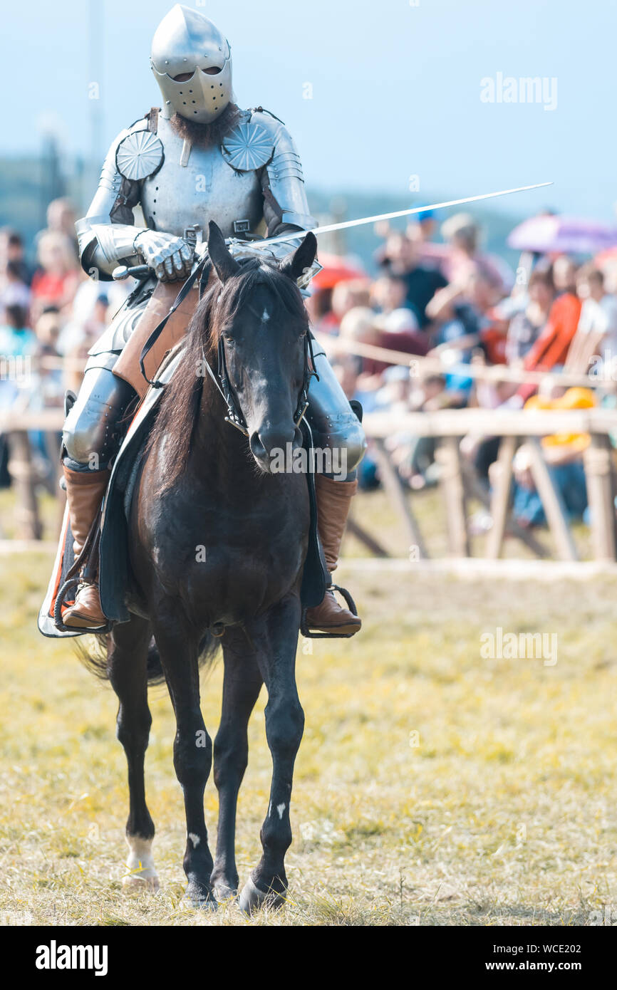 BULGAR, RUSSIA 11-08-2019: Knight riding a black horse on the ...
