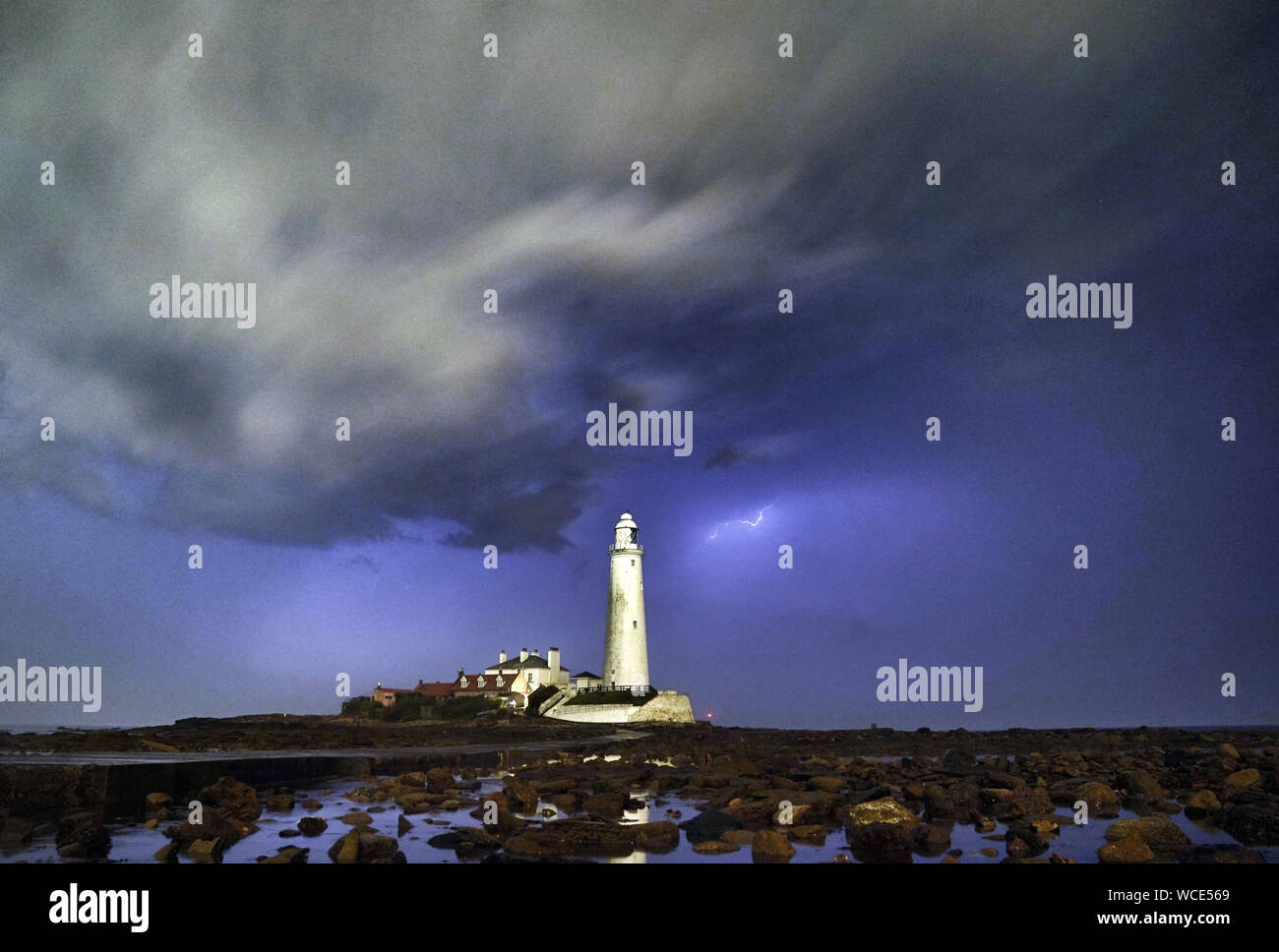 A flash of lightning as a storm passes over St Mary's Lighthouse in ...