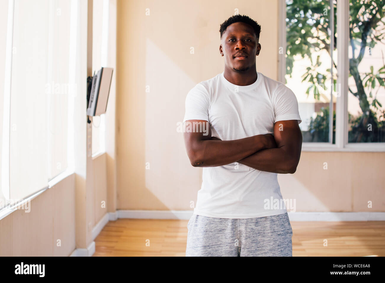 African american male gym trainer hi-res stock photography and images ...