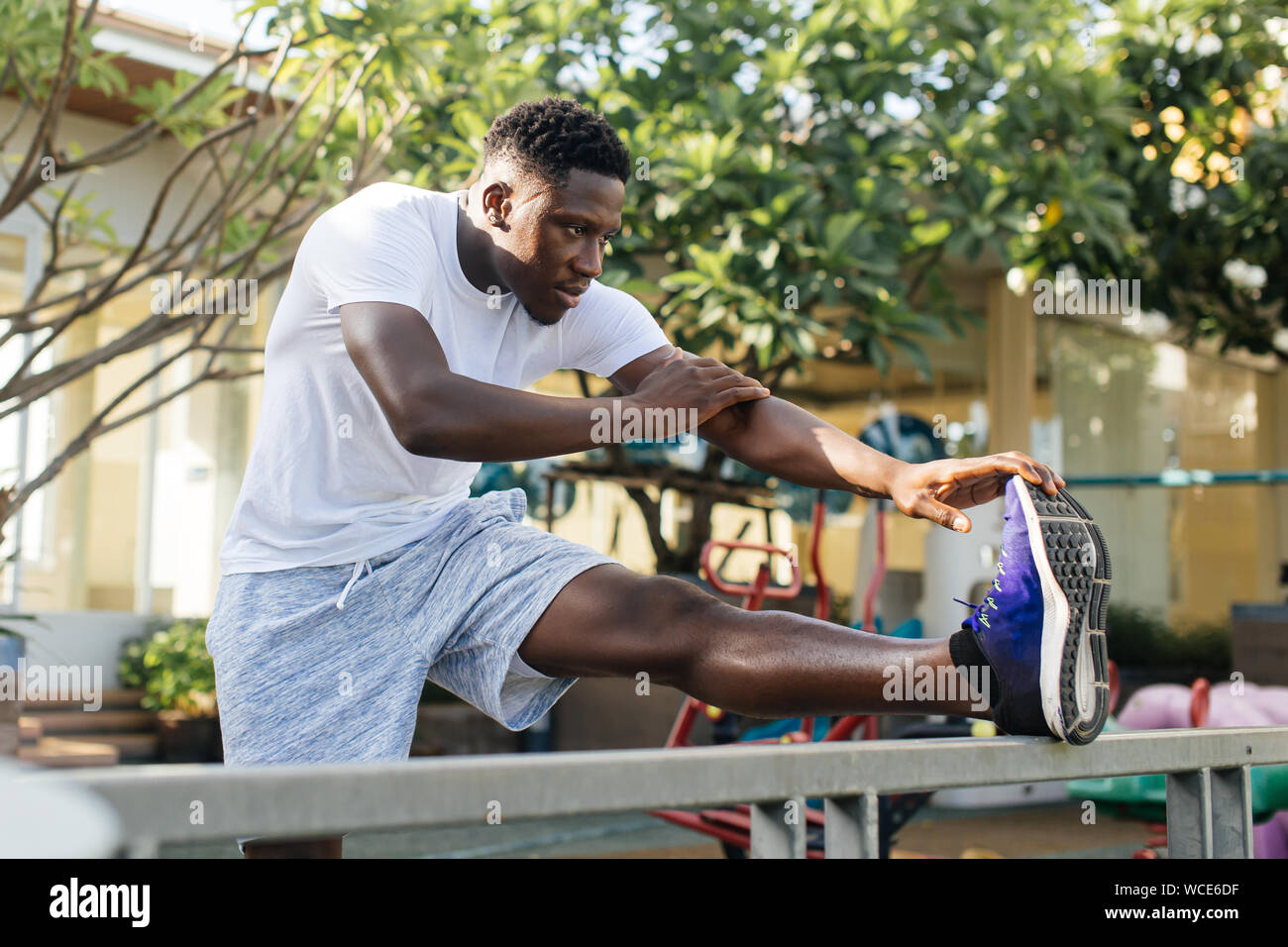 Concentrated muscular sportsman in white hi-res stock photography and ...