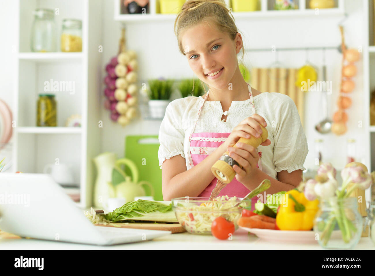 Beautiful girl in kitchen hi-res stock photography and images - Alamy