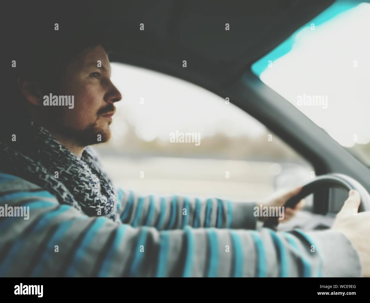 Man driving car side view car interior hi-res stock photography and ...