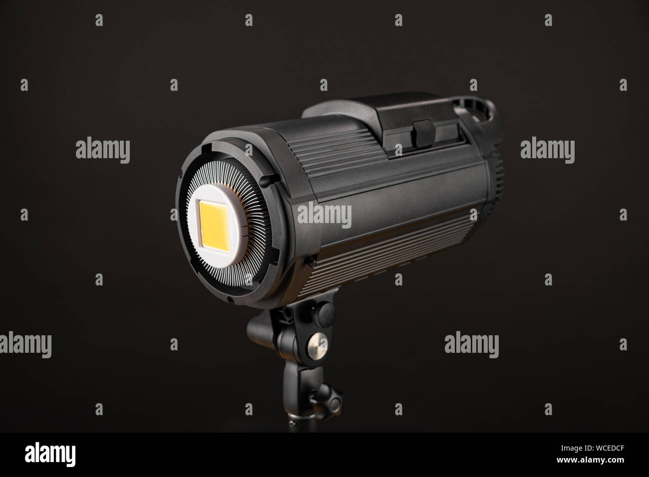 Head of studio flash strobe lamp light. Side view professional studio ...