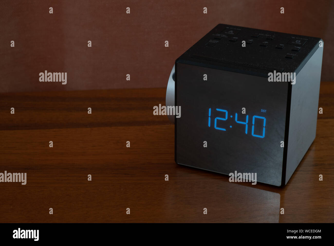 desktop electronic clock in a dark room. alarm clock Stock Photo - Alamy