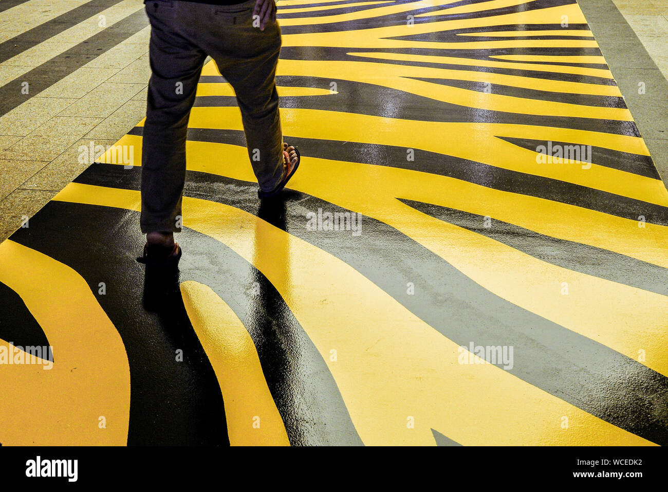 Black man crossing road hi-res stock photography and images - Alamy