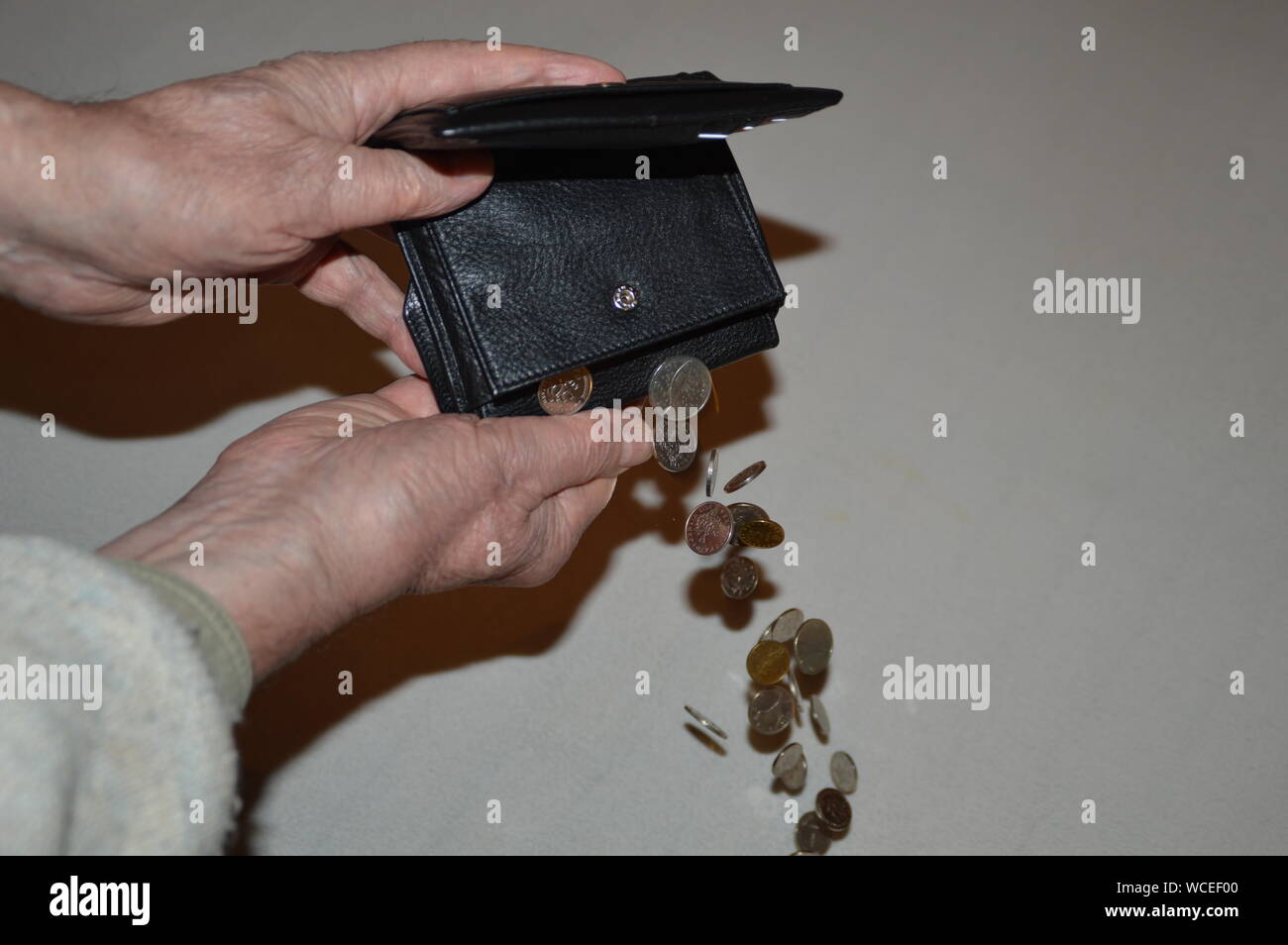 Out Of Wallet High Resolution Stock Photography and Images - Alamy