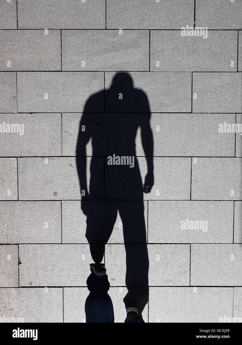 Side view shadow walking hi-res stock photography and images - Alamy