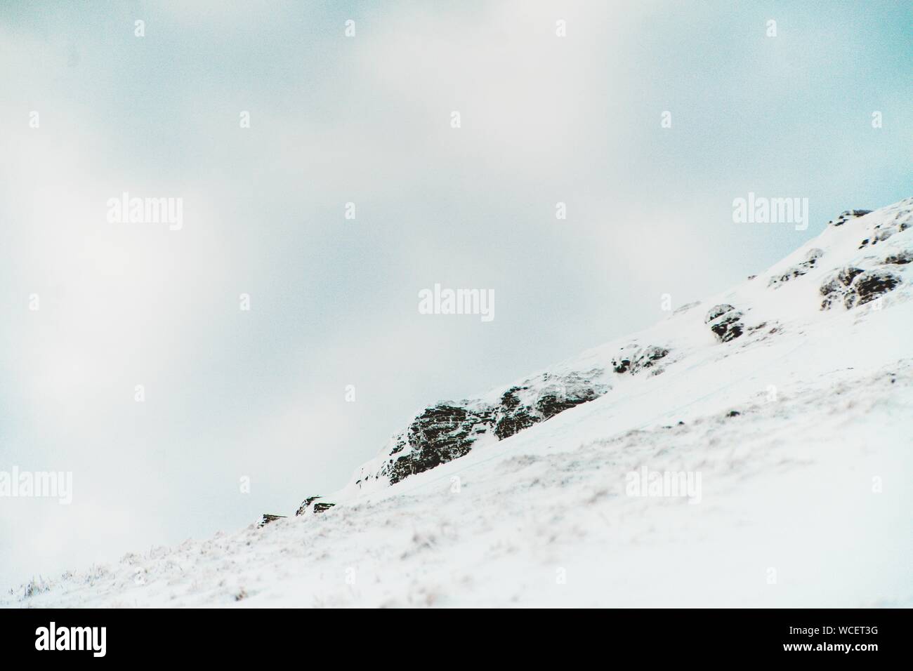 Beautiful scenery of white hills and forests in the countryside during ...