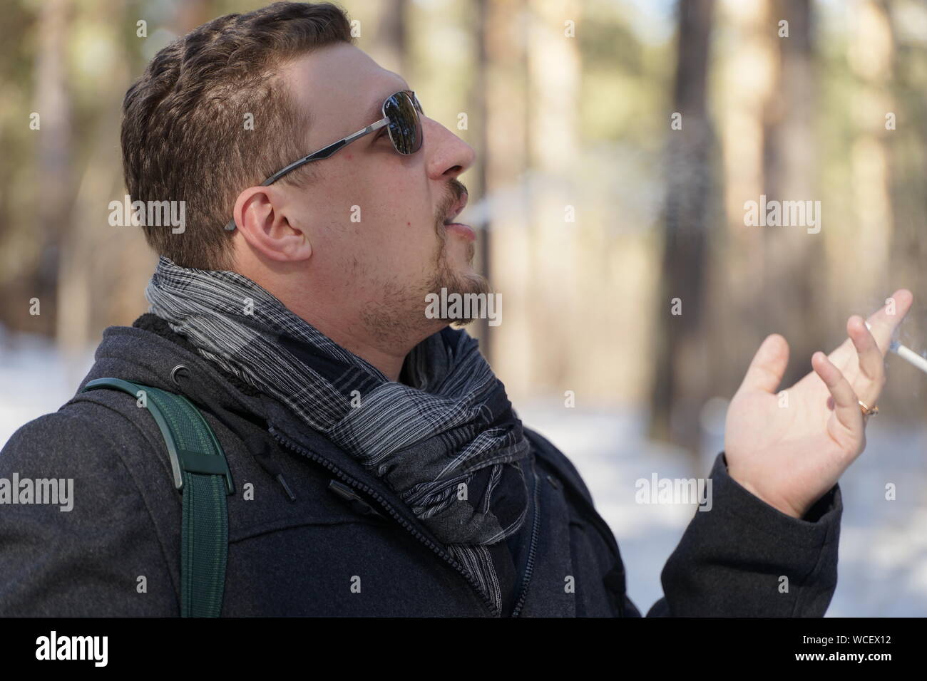 Man smoking in forest addiction hi-res stock photography and images - Alamy