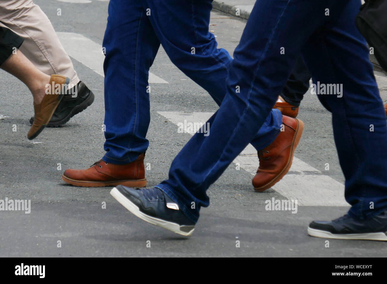 Low people walking street city motion hi-res stock photography and ...