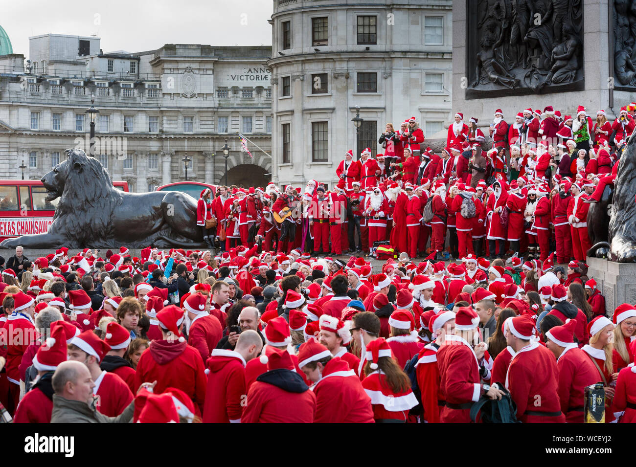 Hundreds of Santas flood Trafalgar Square for the annual, global ...