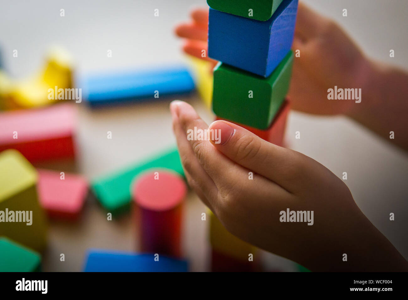 Holding up toys hi-res stock photography and images - Alamy