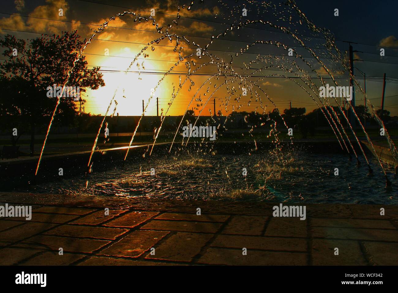 Water fountain sunset hi-res stock photography and images - Alamy