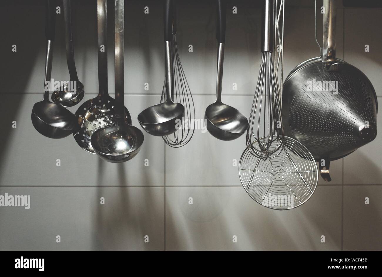 Hanging utensils hi-res stock photography and images - Alamy