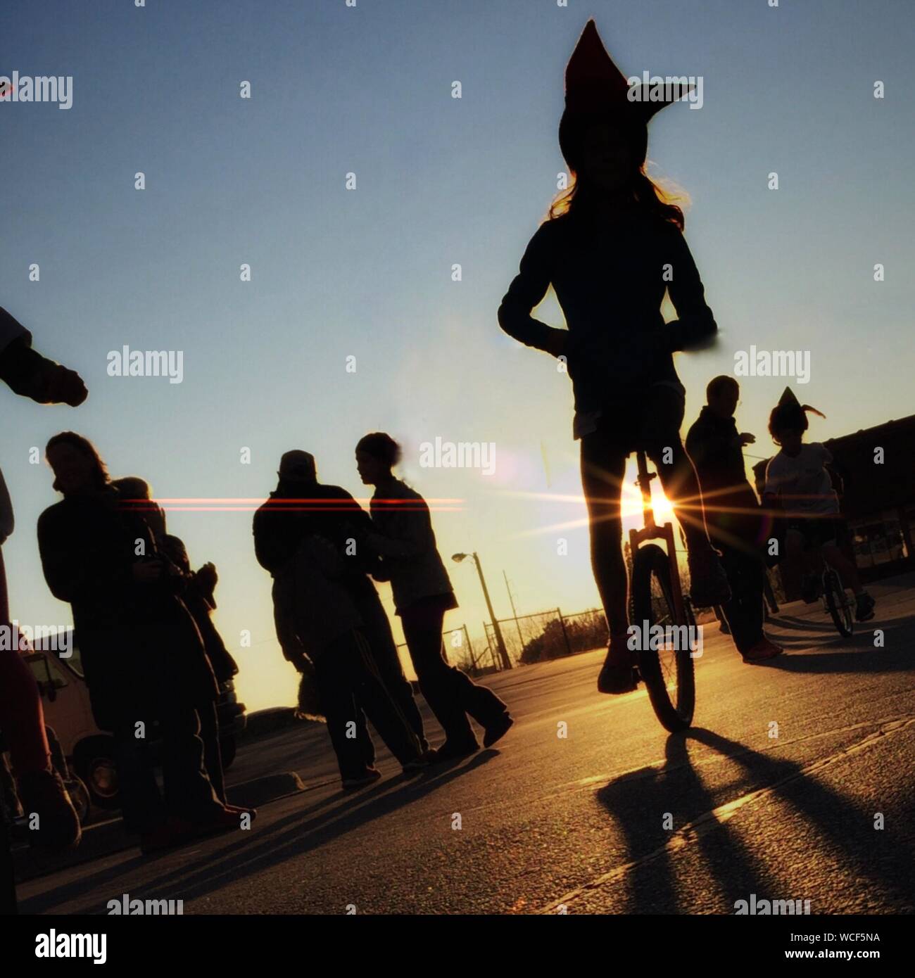 Girl riding bicycle low angle hi-res stock photography and images - Alamy