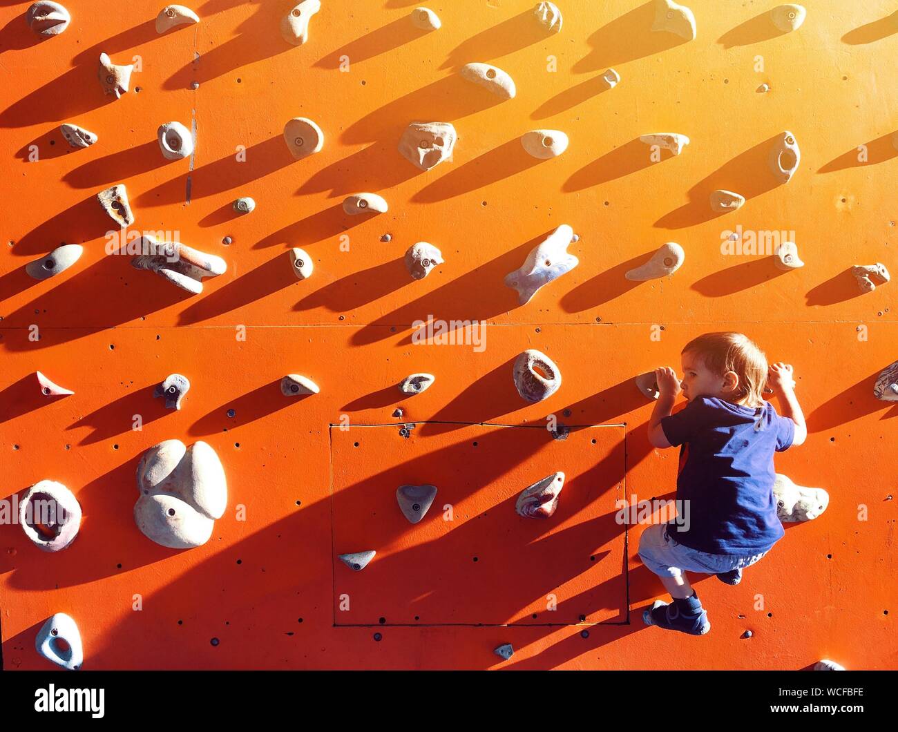 Boys climbing wall hi-res stock photography and images - Alamy