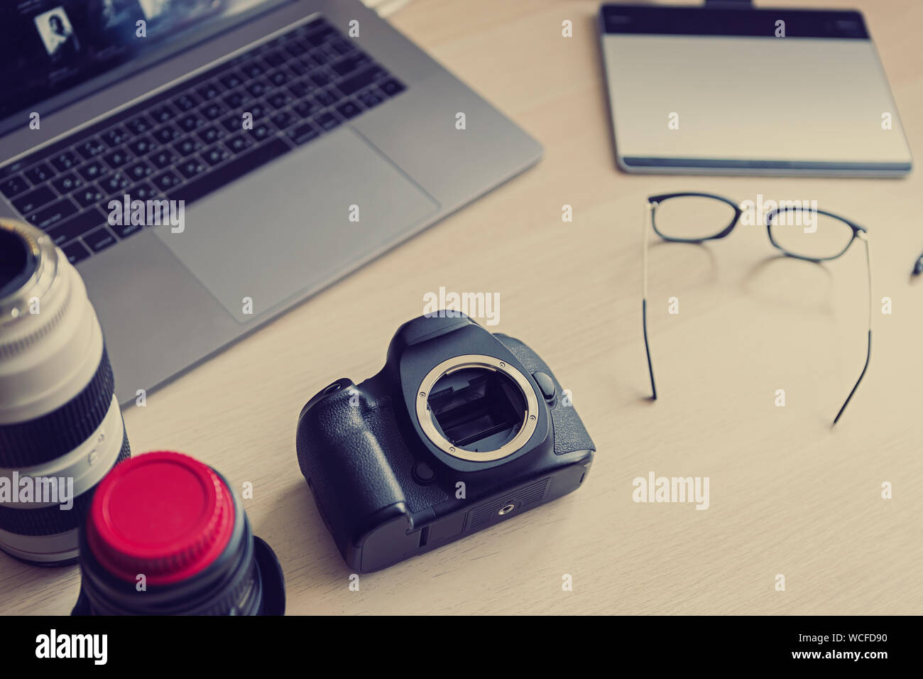 Professional photo studio desk with tools for creative photographer.Big ...