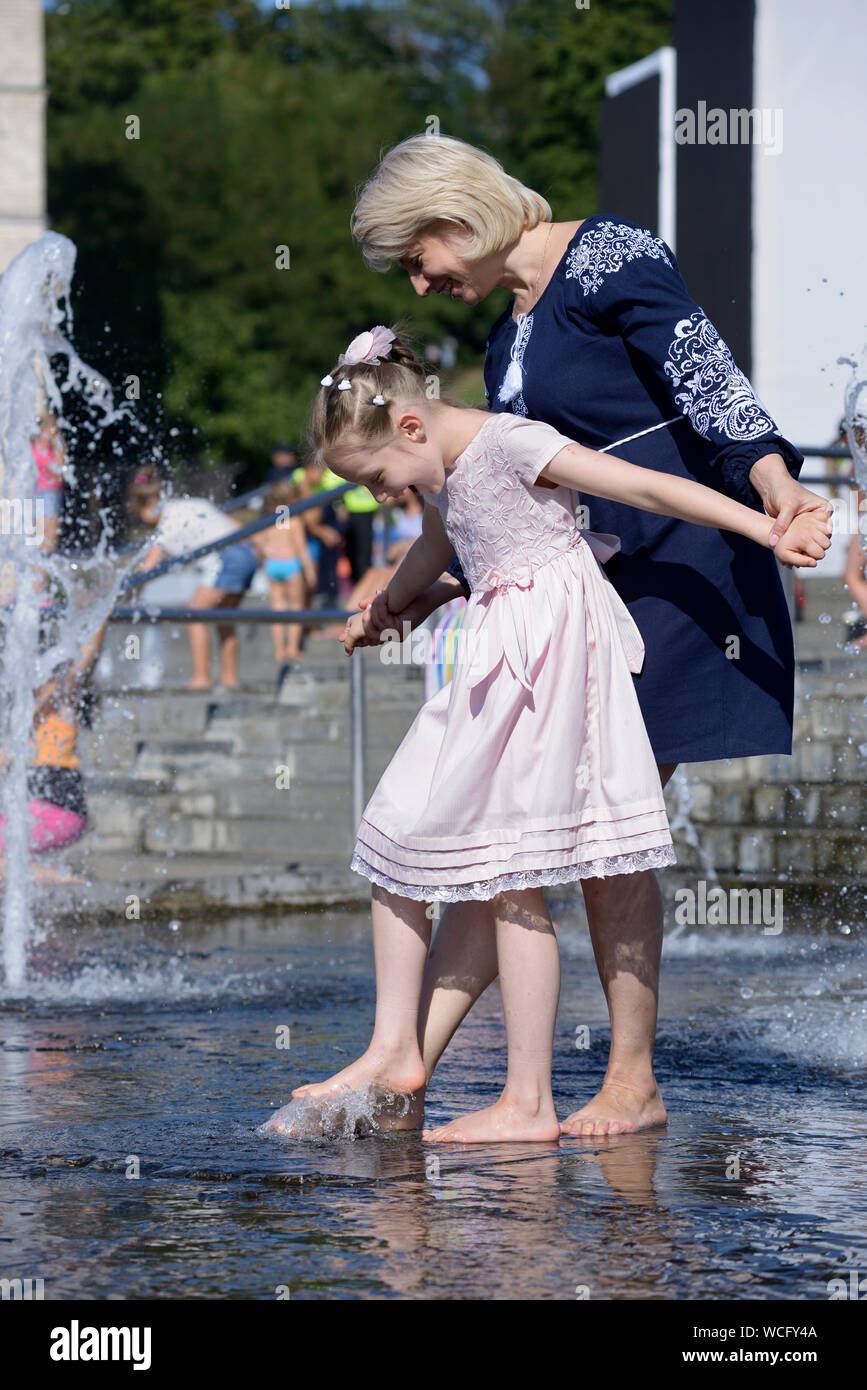 Girl Playing In Water Jets High Resolution Stock Photography and Images ...