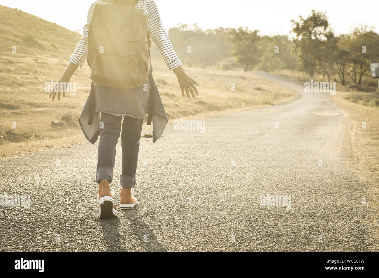 Woman and walking and rear view hi-res stock photography and images - Alamy