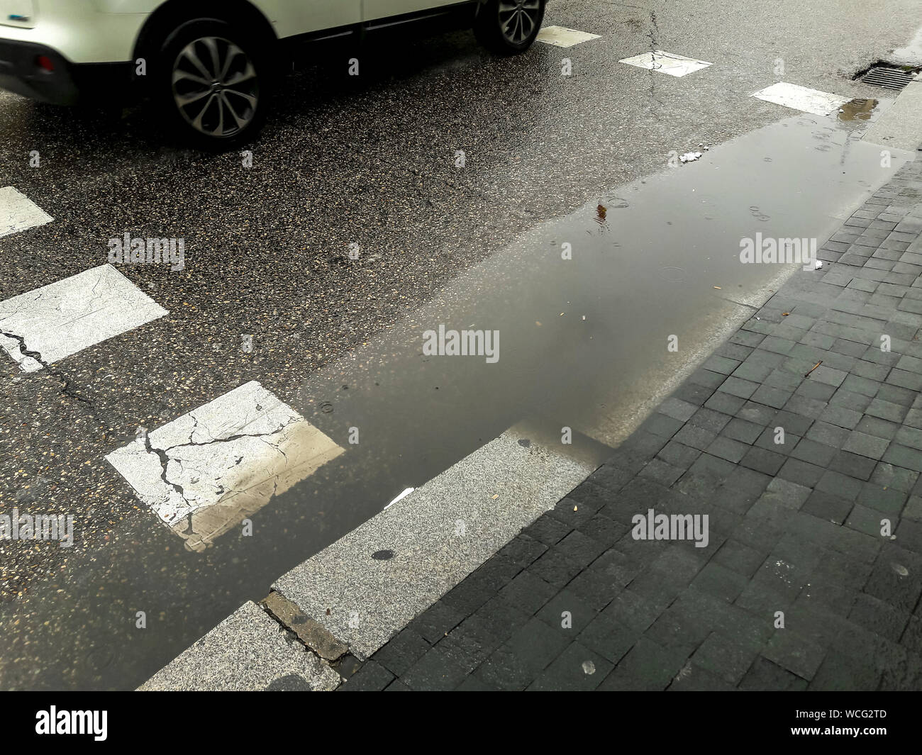 Car Puddle Pedestrian High Resolution Stock Photography and Images - Alamy