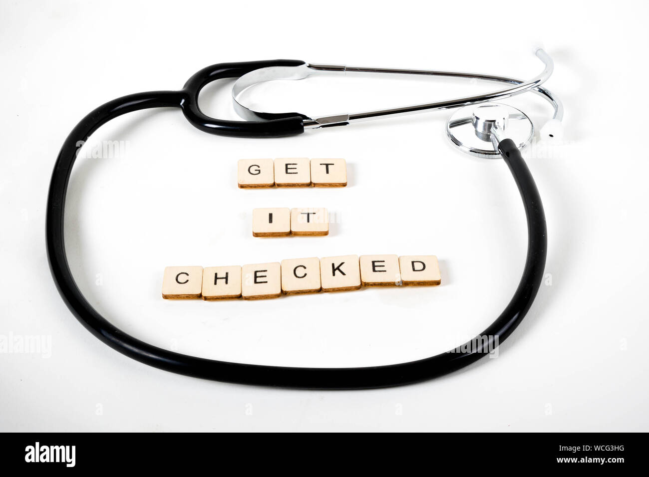 Medical or Healthcare concept with a stehoscope and the message Get It ...