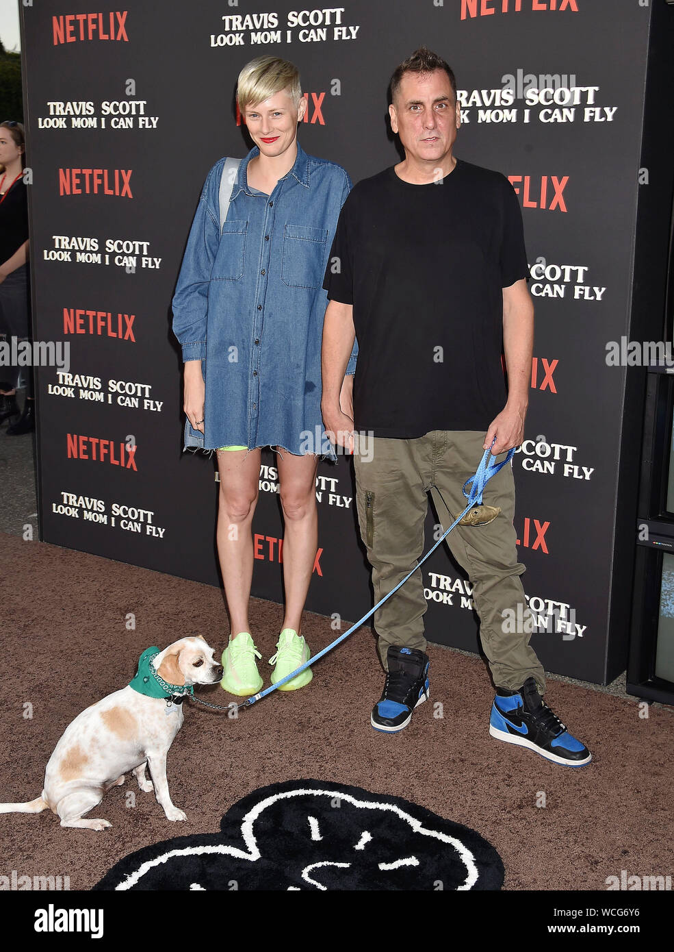 SANTA MONICA, CA - AUGUST 27: Mike Dean (R) and guest attend the Travis ...