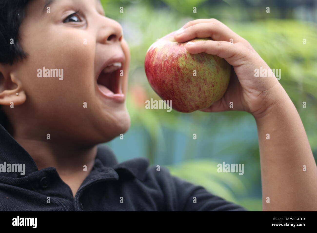One boy eating hi-res stock photography and images - Alamy