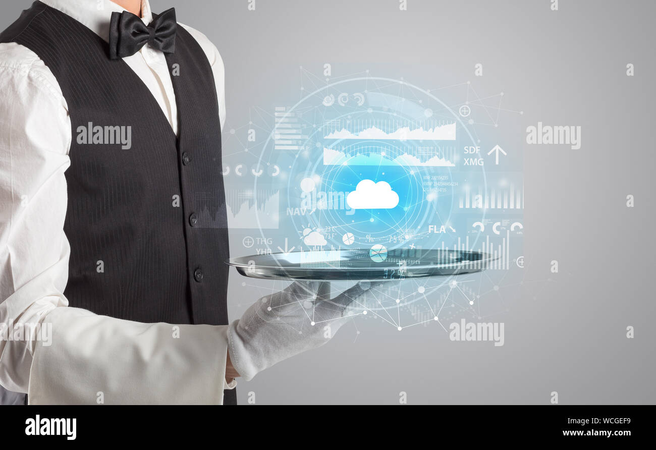 Elegant young waiter serving cloud technology concept Stock Photo - Alamy