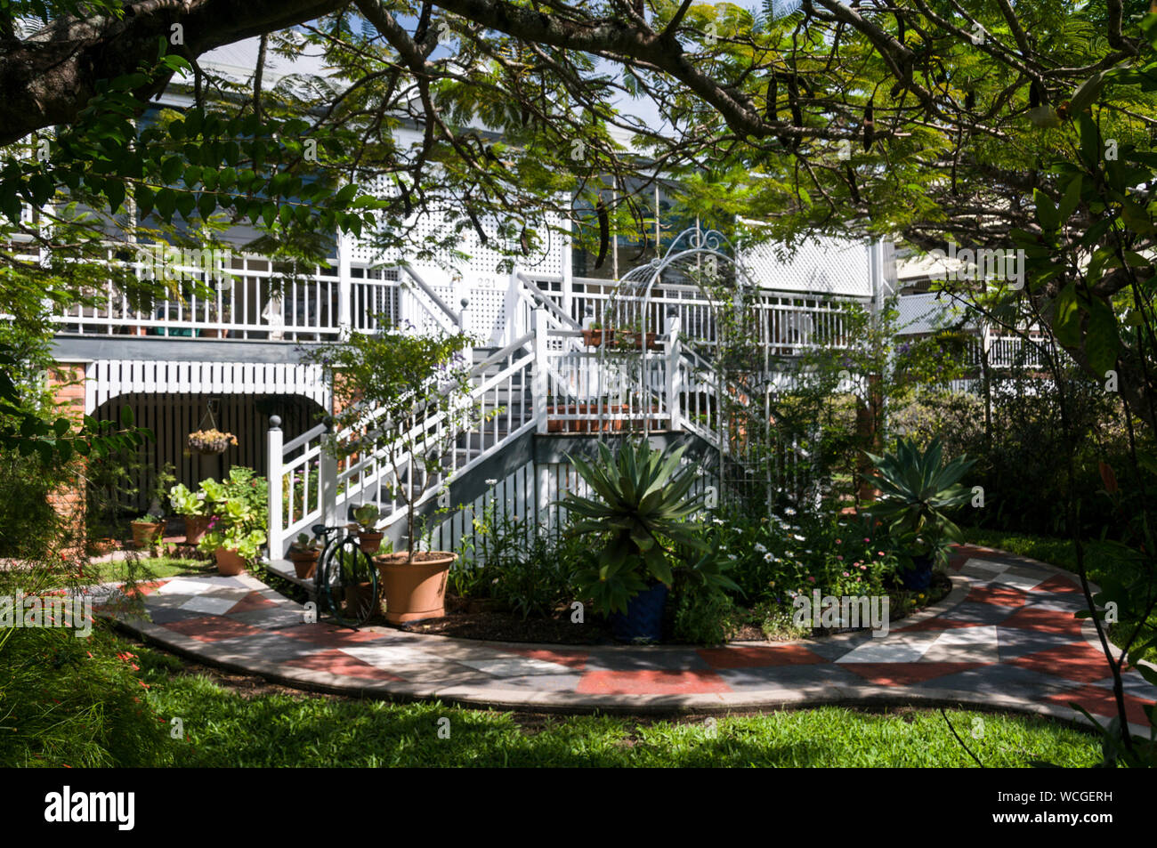 A Federation Queenslander house designed and built on stilts, is an ...