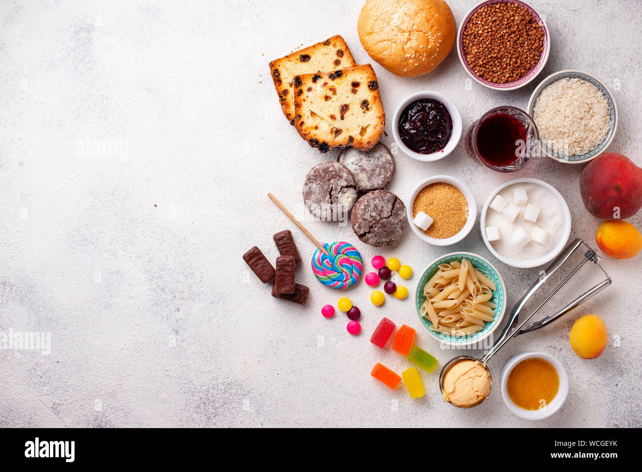 Assortment of simple carbohydrates food Stock Photo - Alamy