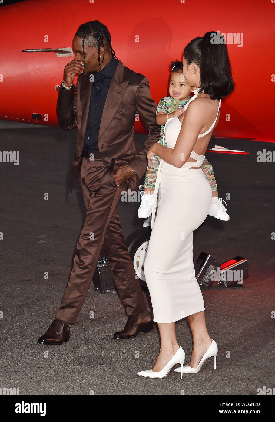 SANTA MONICA, CA - AUGUST 27: (L-R) Travis Scott, Stormi Webster and ...