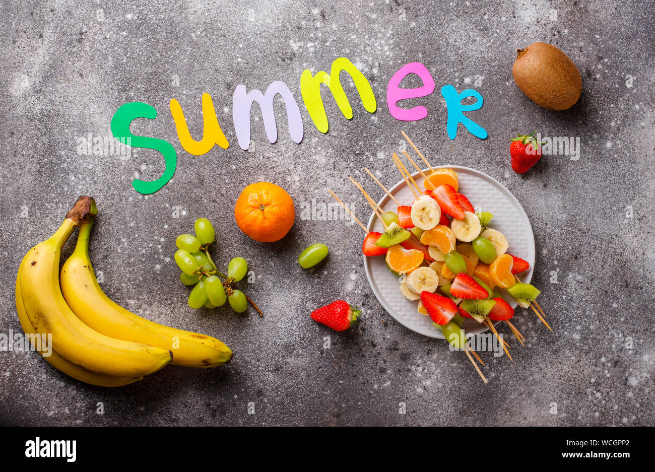 Fruit skewers, healthy summer snack Stock Photo - Alamy
