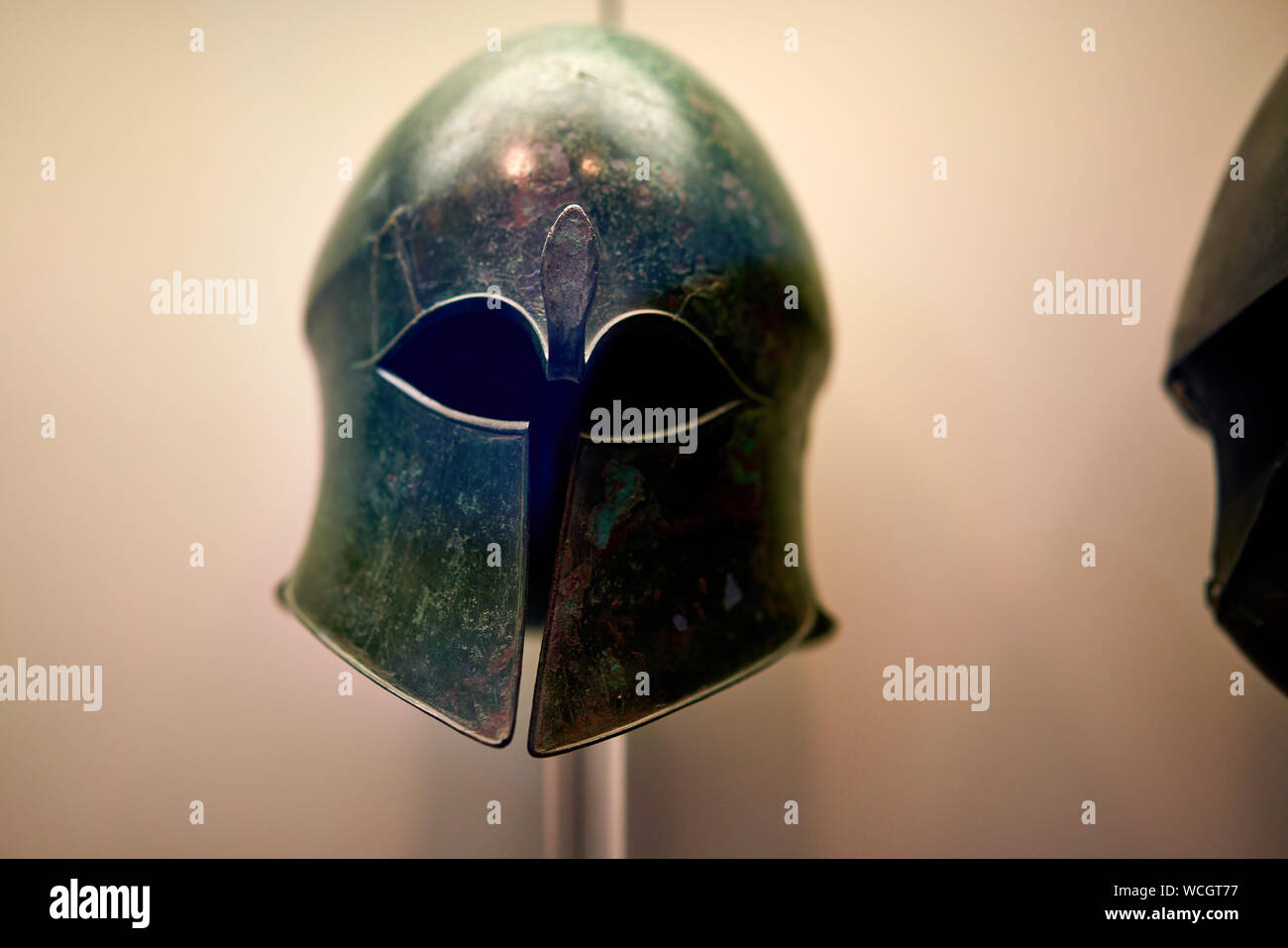 Ancient Greek hoplite helmets on display at Olympia in Greece Stock ...