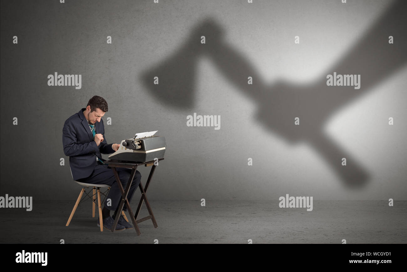 Shadow threatening hard worker man who is afraid Stock Photo - Alamy