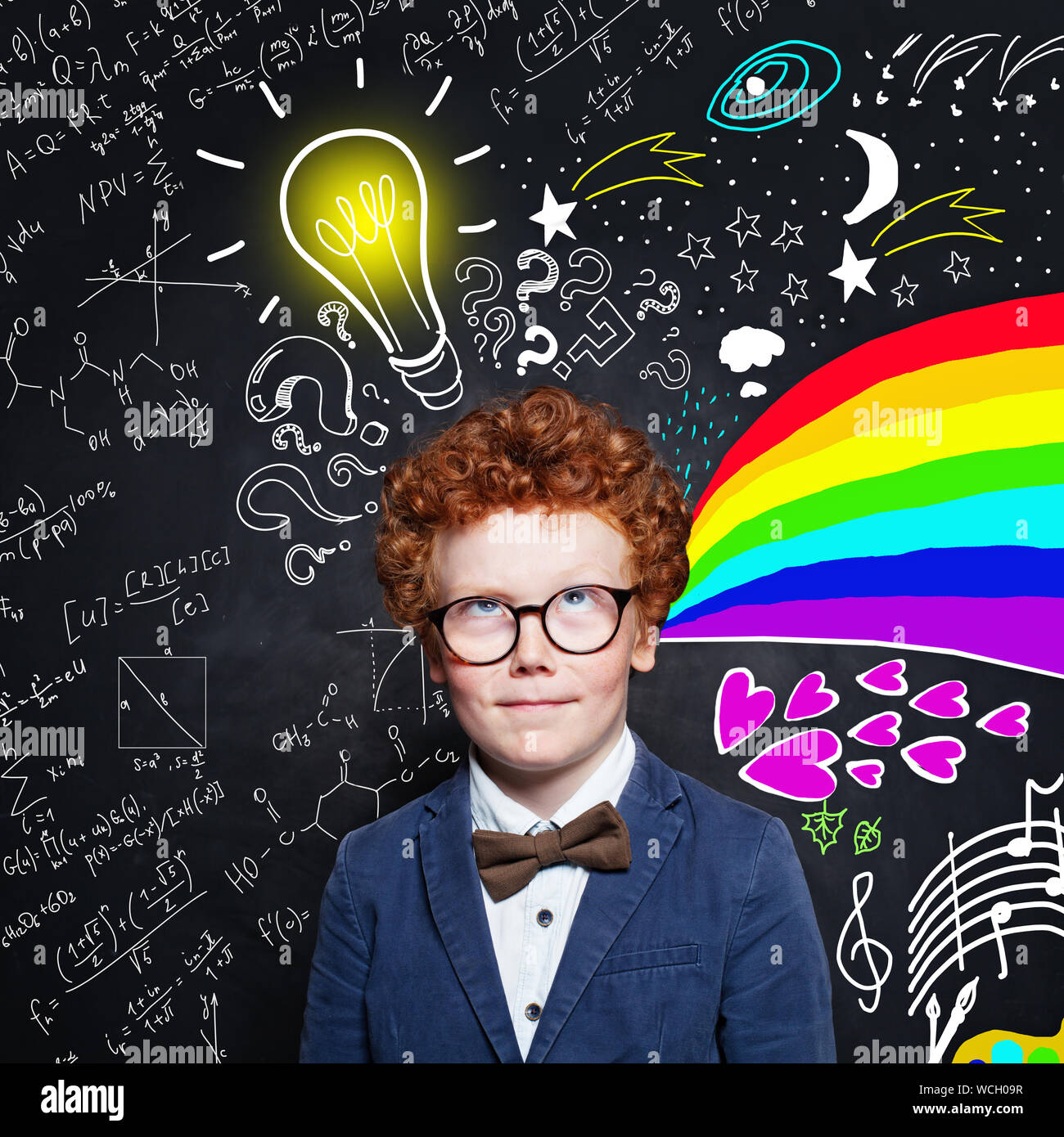 Kid and idea light bulb on school blackboard Stock Photo - Alamy