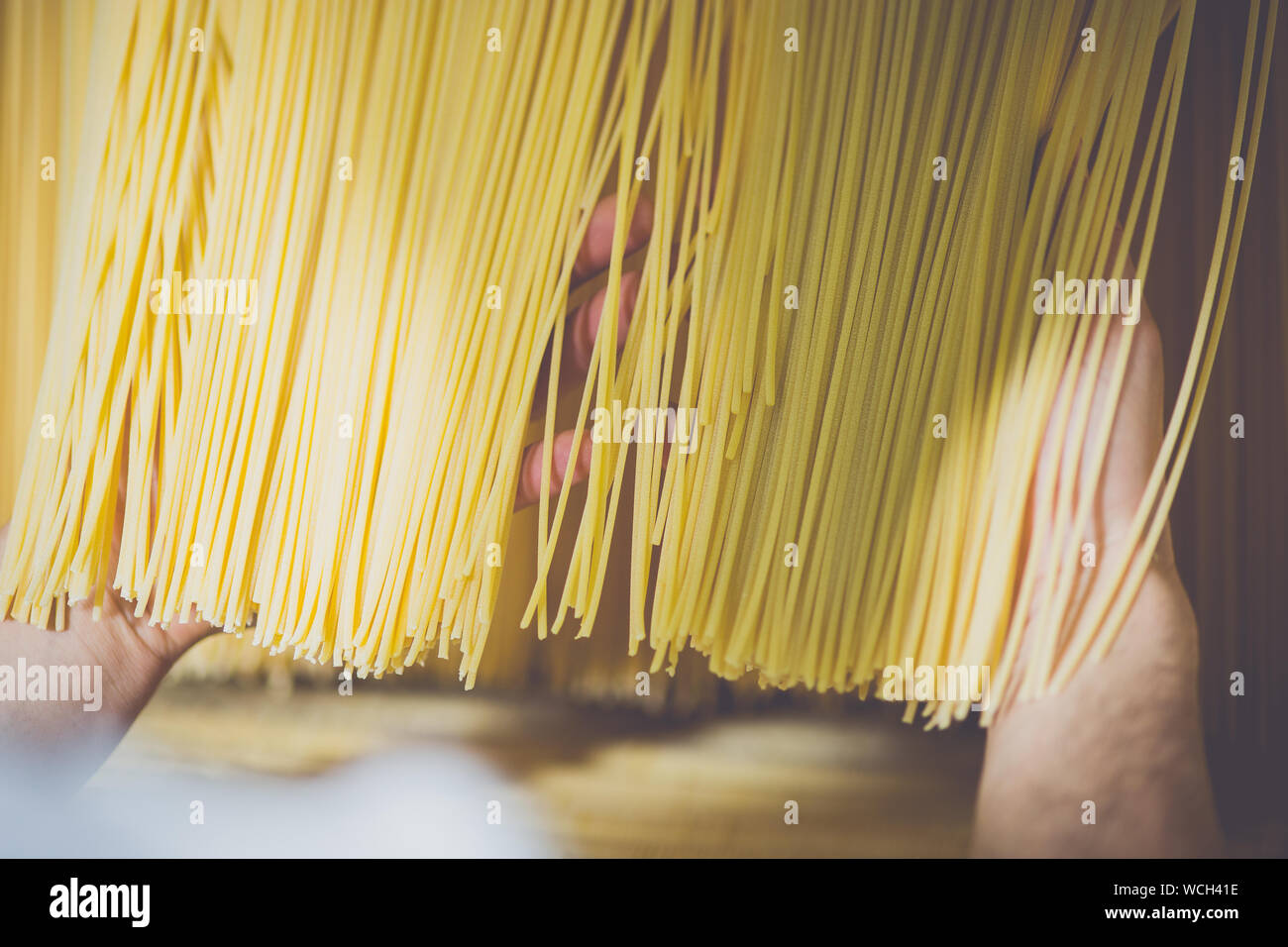 Hand with spaghetti hi-res stock photography and images - Alamy
